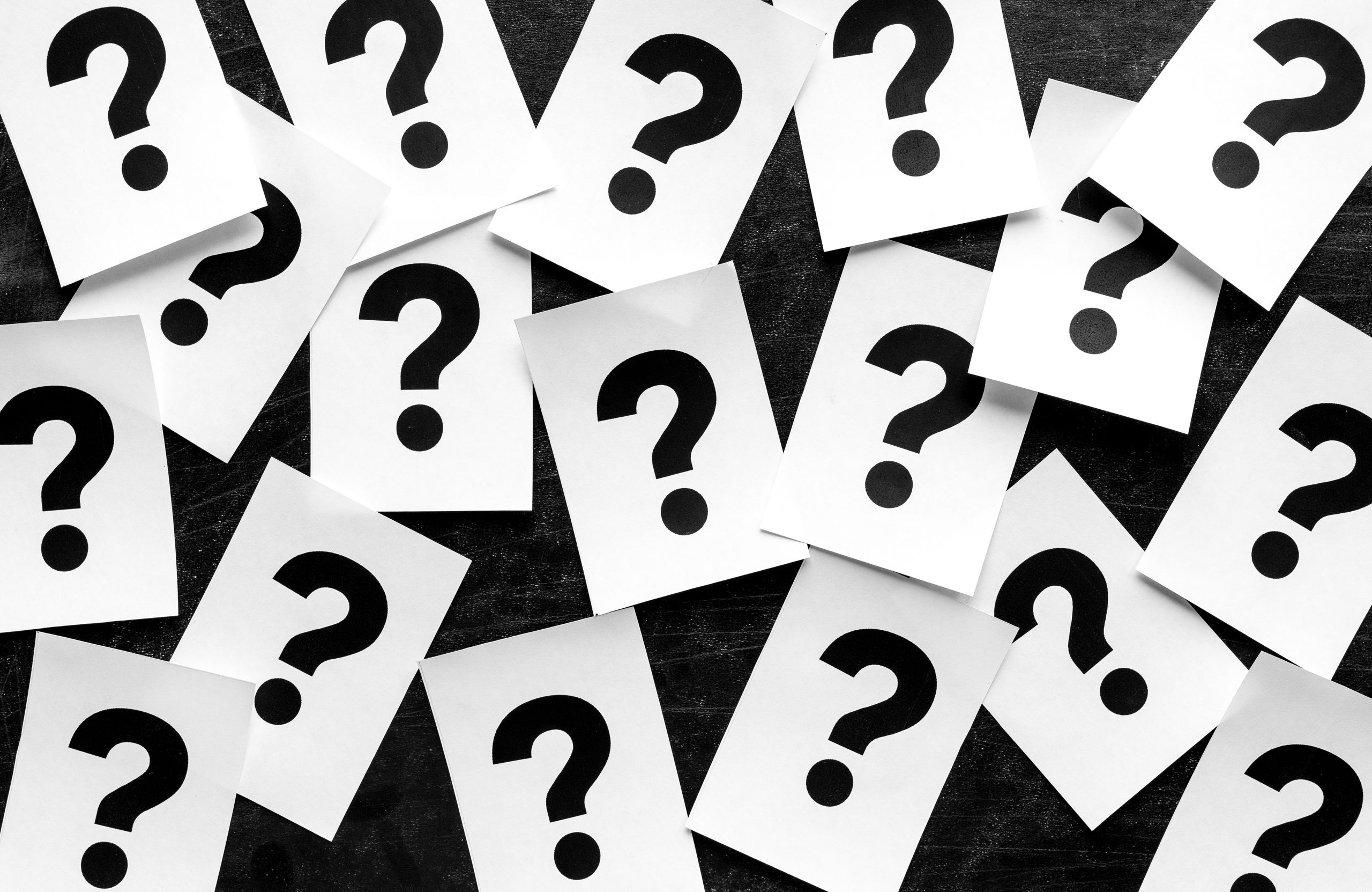 Bold Black Question Marks On Paper Cards Economy